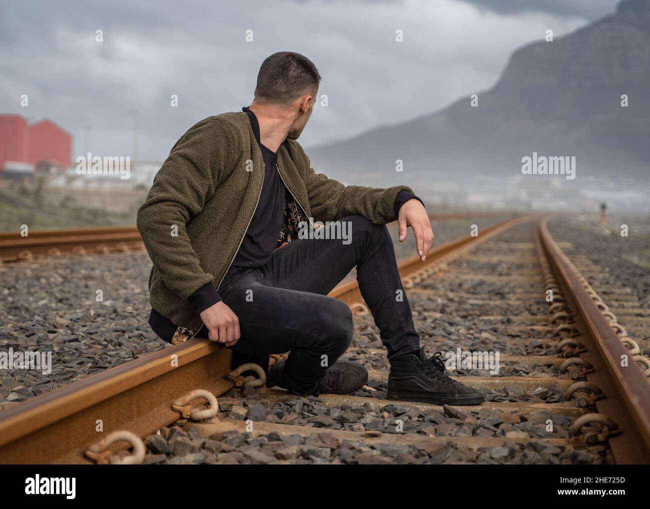 Guy on railway tracks hi-res stock photography and images - Alamy