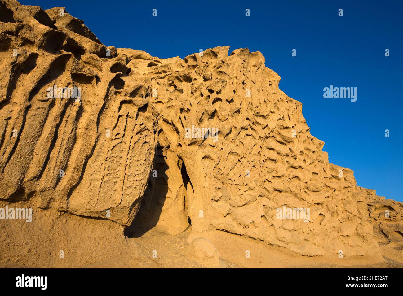 View at Vlychada beach volcanic ash sand rock formation on Santorini ...