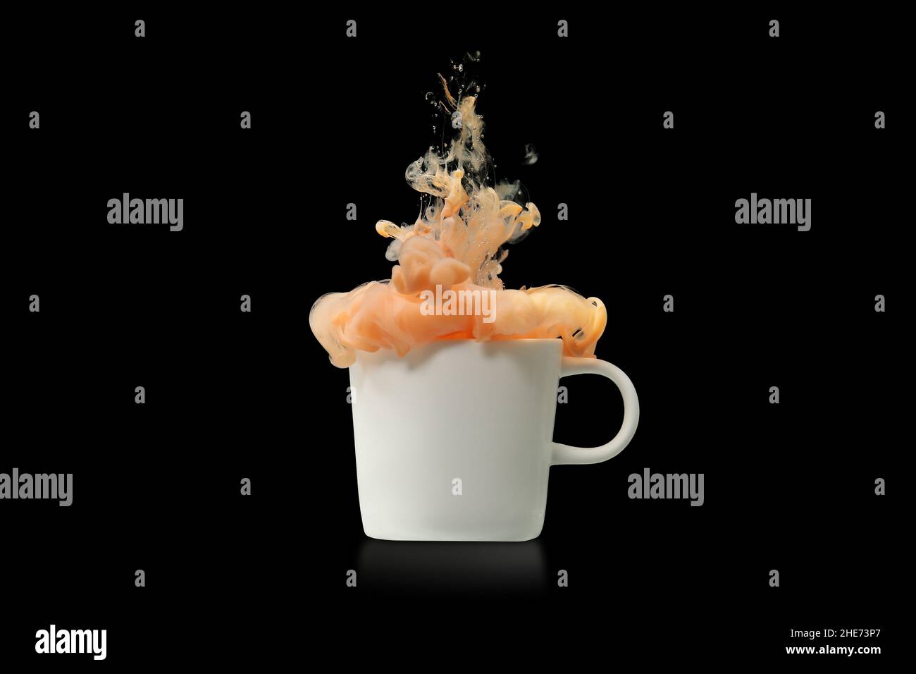 Coffee cup with splash of paint on dark background Stock Photo - Alamy