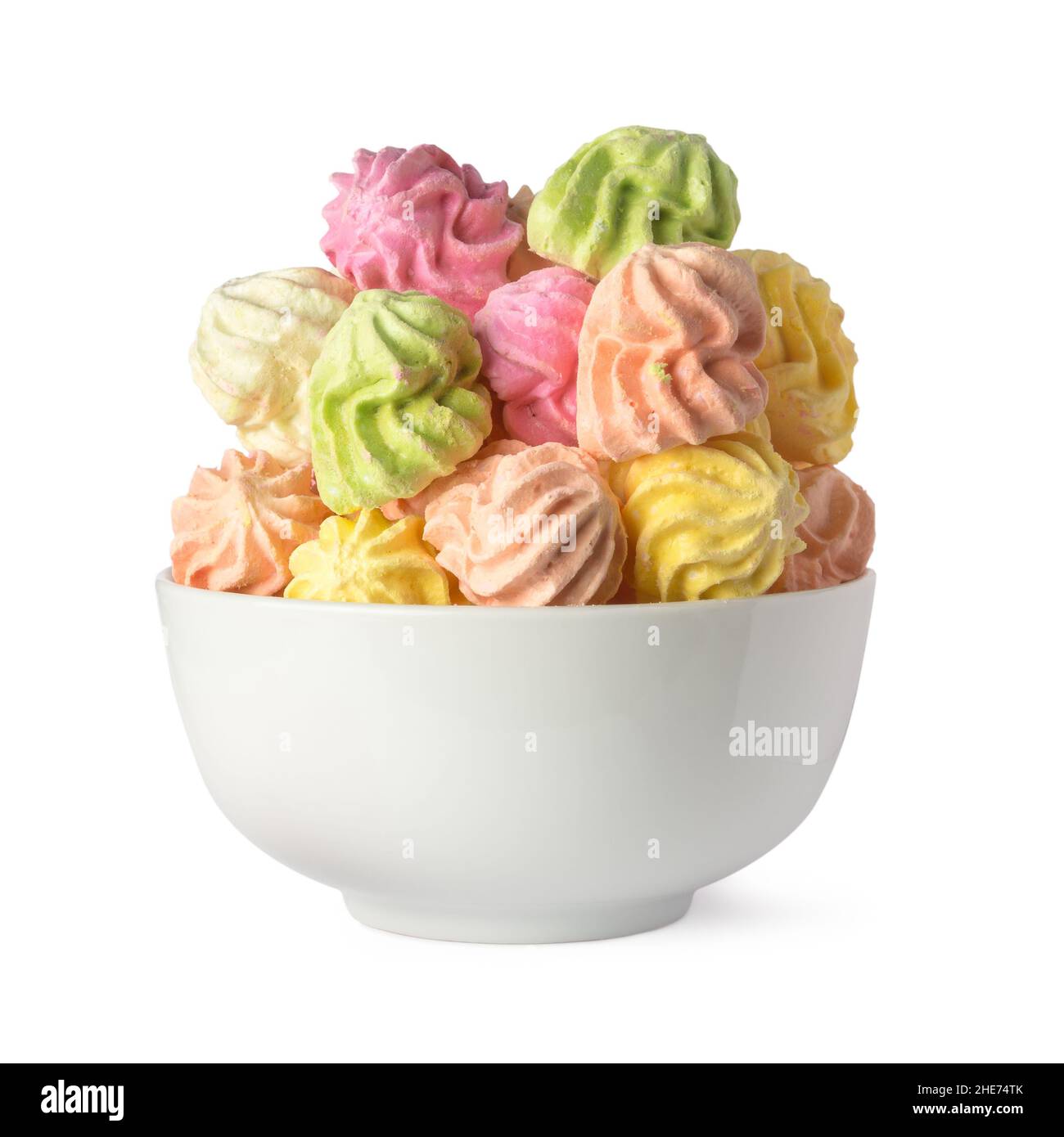meringue cookies in a bowl, also known as kisses, colorful, light ...