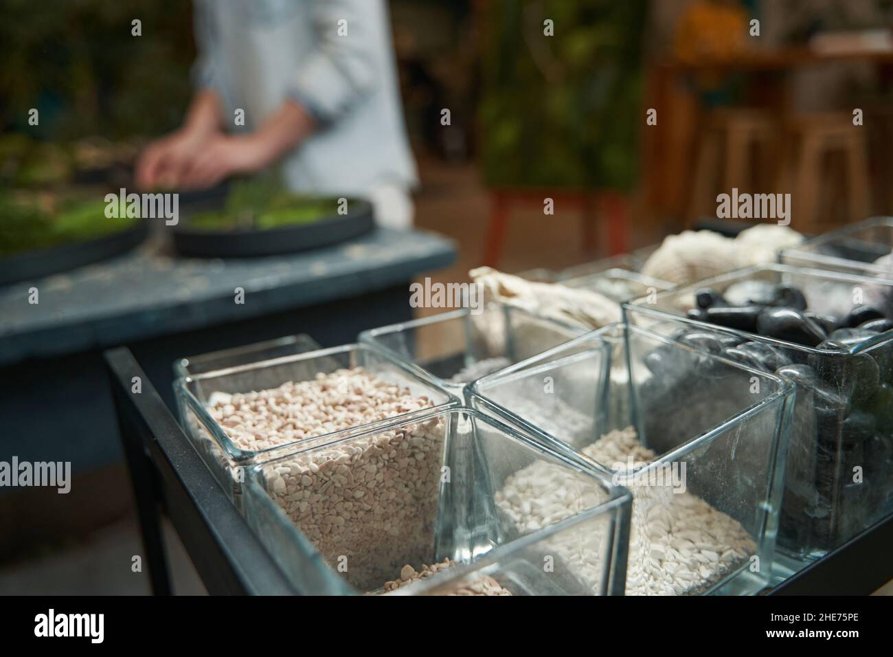 Glass boxes with variety of material for decoration Stock Photo - Alamy