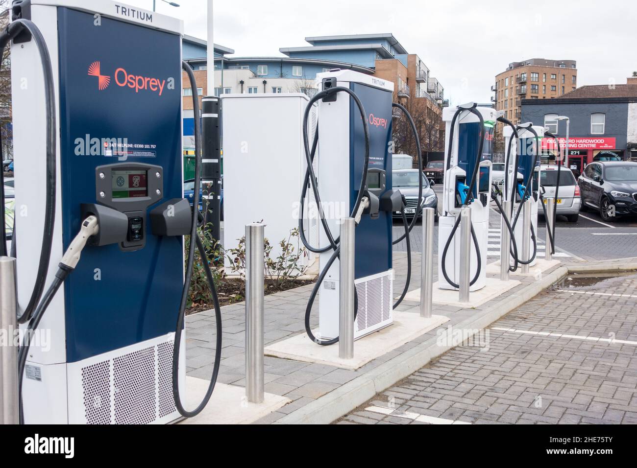 EV Car charging parking space with electrical charging units in ...