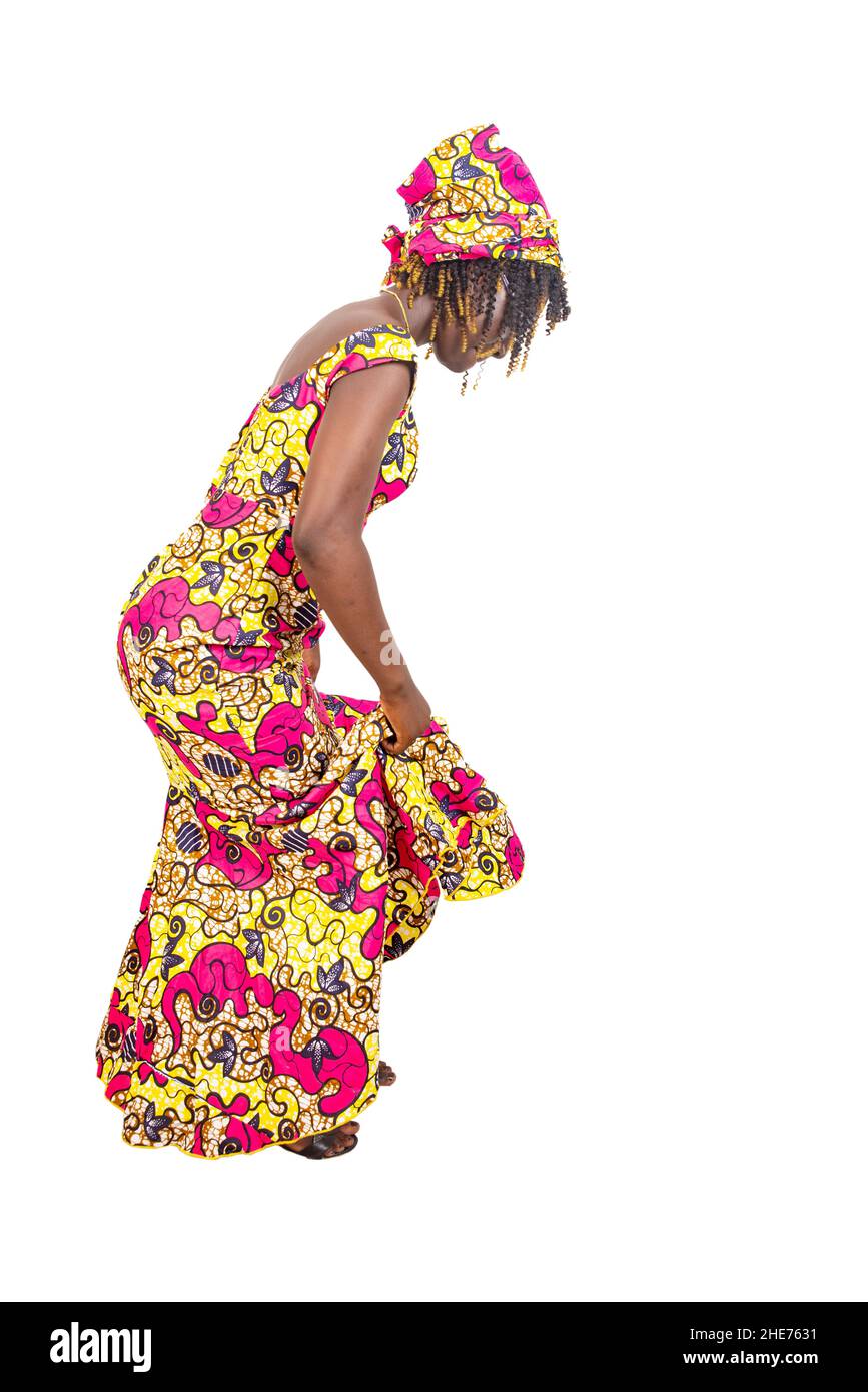 beautiful young woman in traditional dress standing on white background ...