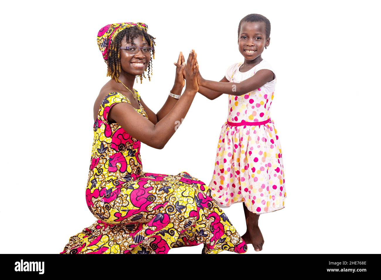 beautiful family isolated on white background clapping and looking at ...