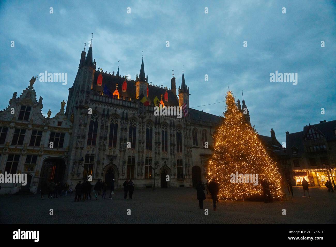 Christmas trees in the city centre of Bruges during dusk Stock Photo ...