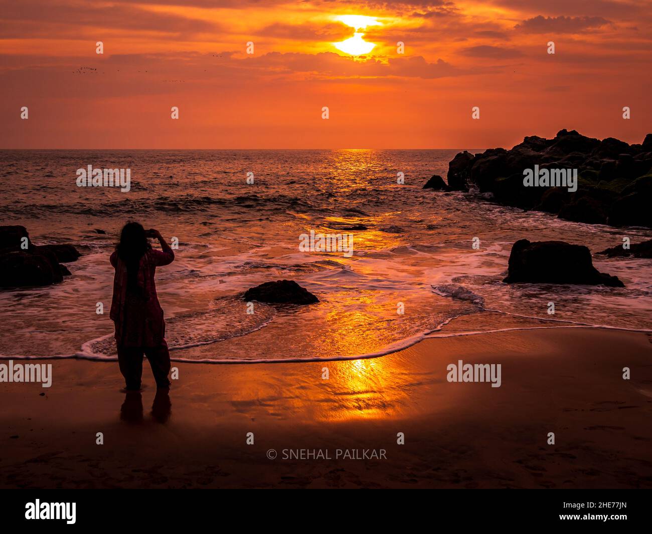Silhouette of tourist taking photos by mobile at devghali or Kasheli ...