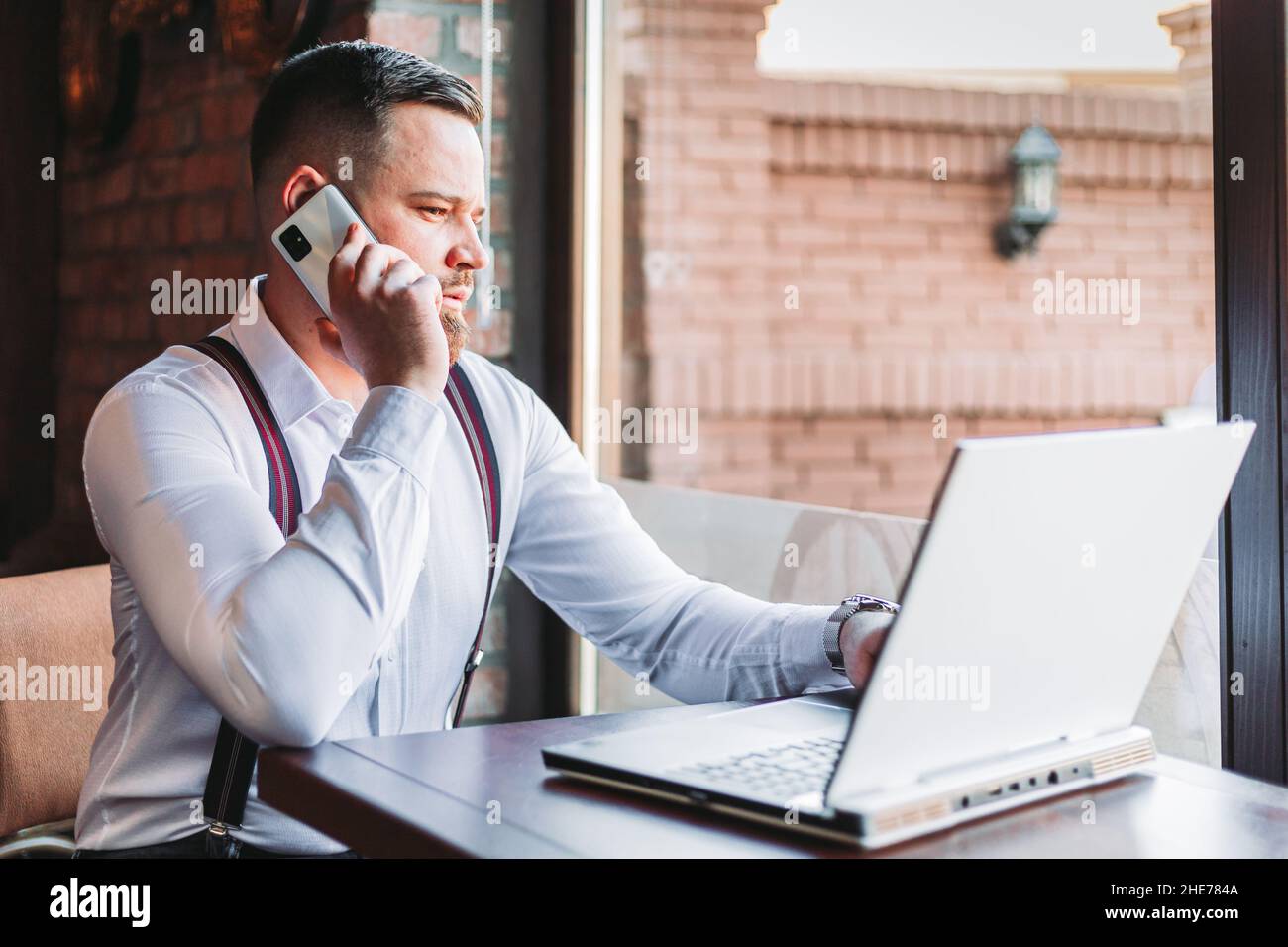 Laptop cellphone work hi-res stock photography and images - Alamy