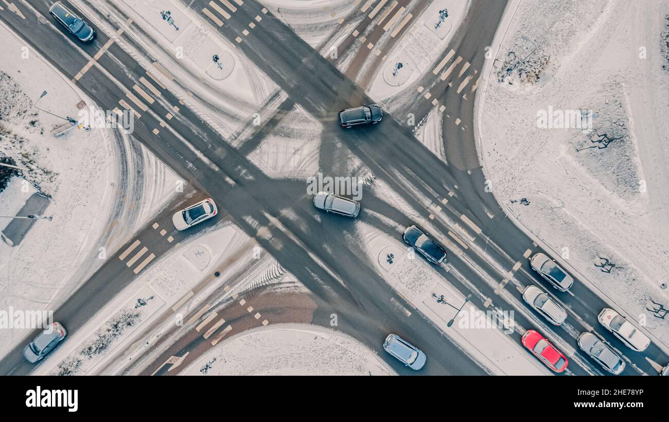 Street intersection in winter, aerial view. Low traffic on snowy winter ...