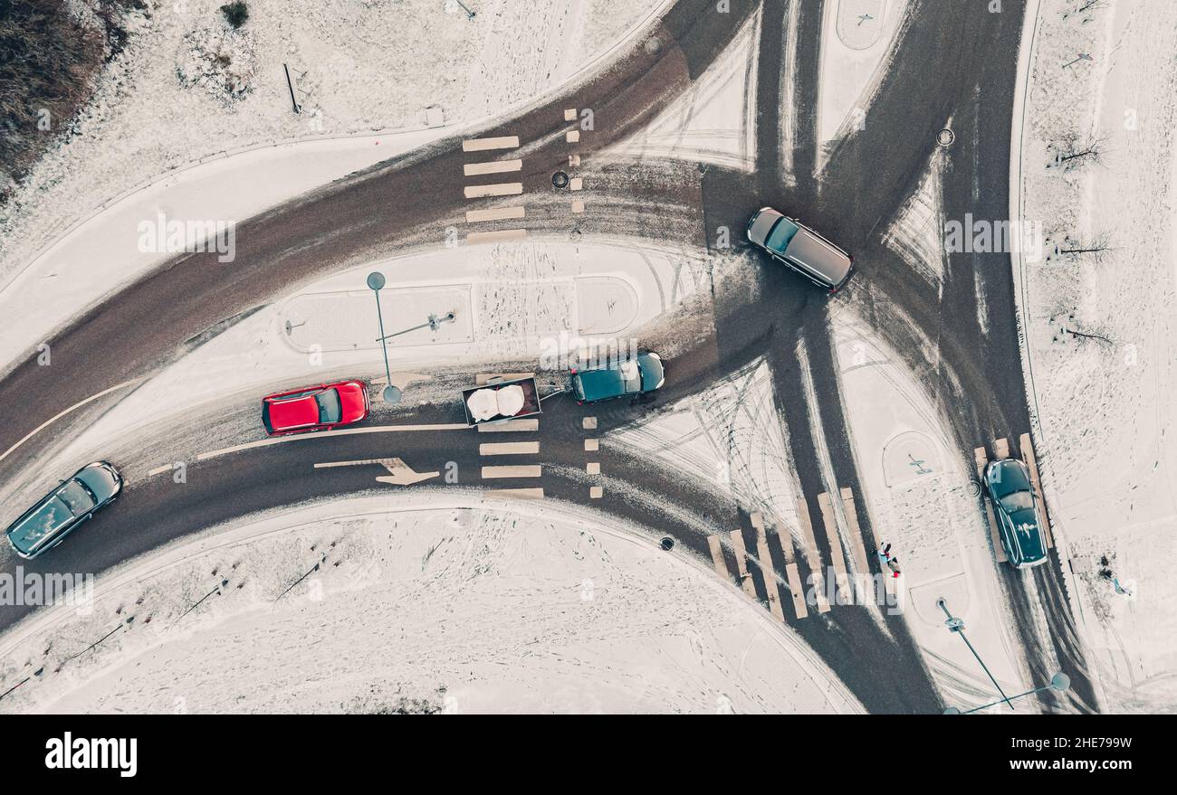 Street intersection in winter, aerial view. Low traffic on snowy winter ...