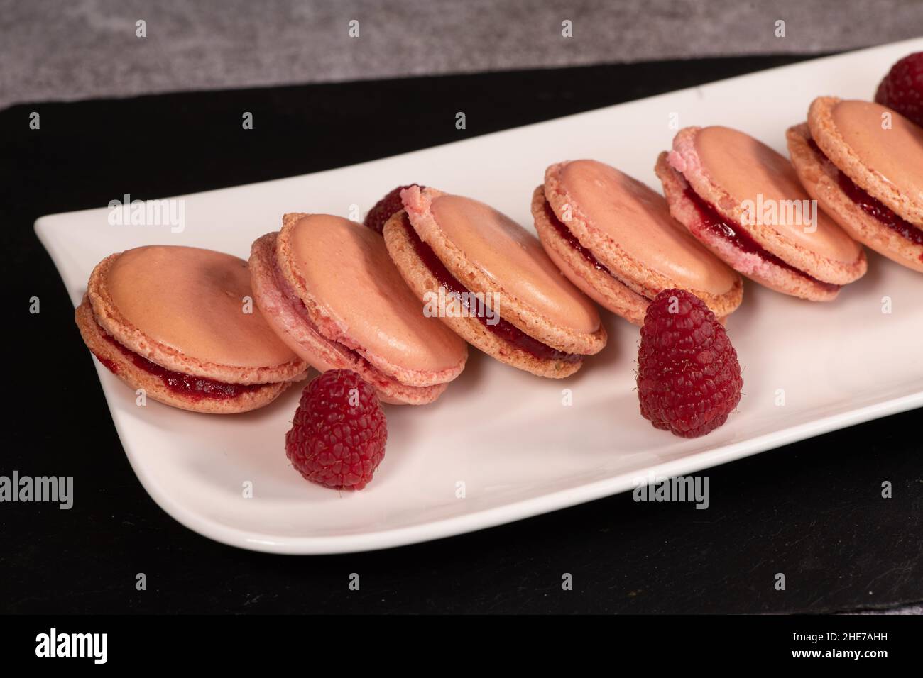 Pastry, Macaroon recipe with raspberry cream filling Stock Photo - Alamy