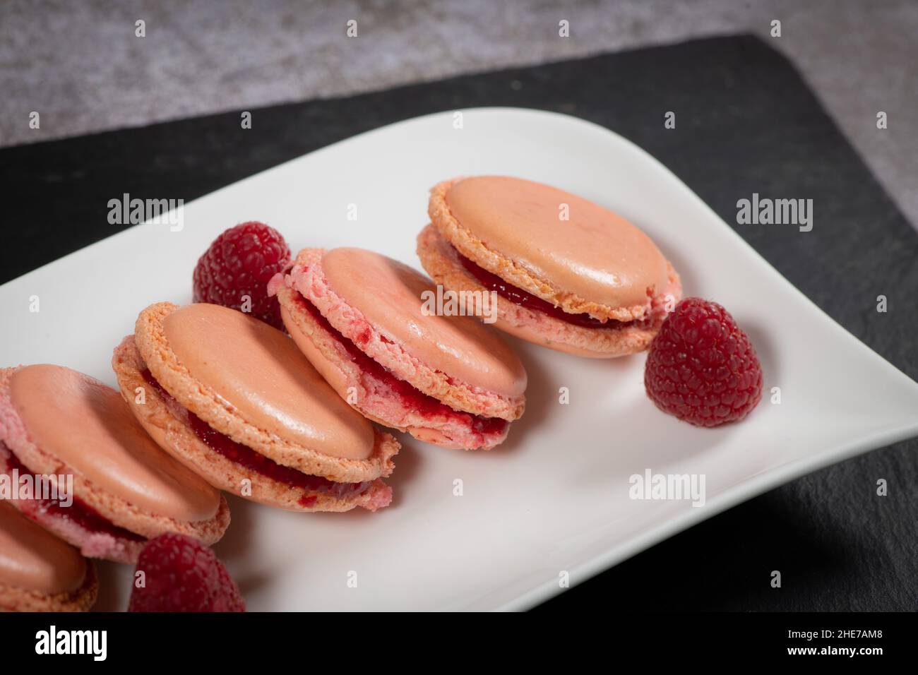 Pastry, Macaroon recipe with raspberry cream filling Stock Photo - Alamy