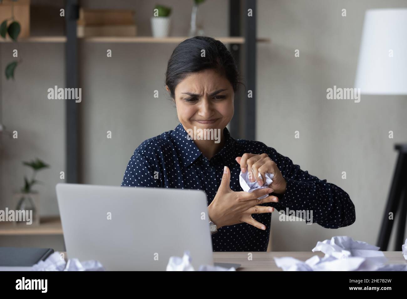Woman throwing crumpled paper hi-res stock photography and images - Alamy