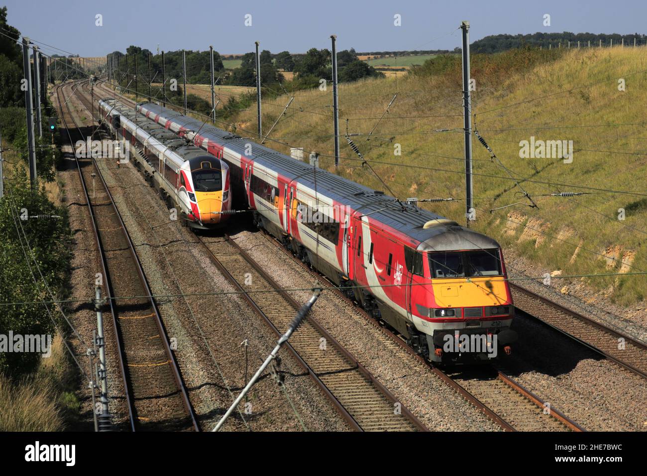 LNER Class 800 Azuma train passing 82212 DVT train, East Coast Main ...