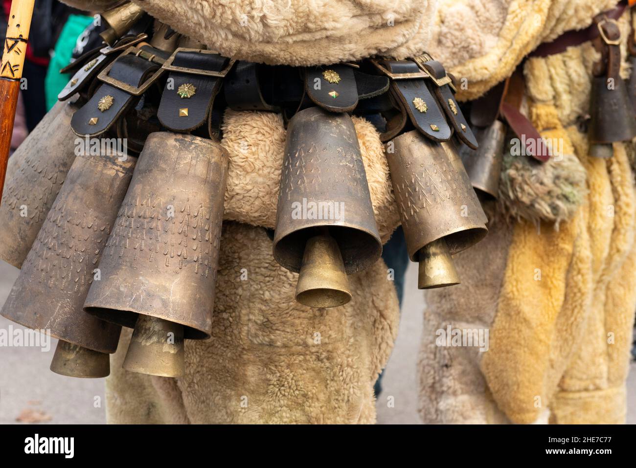 Kukeri dancers with intricate costumes, large bells and masks dancing ...