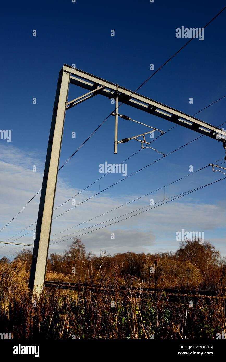 Overhead live wires along the East Coast railway line. (Seen from a ...