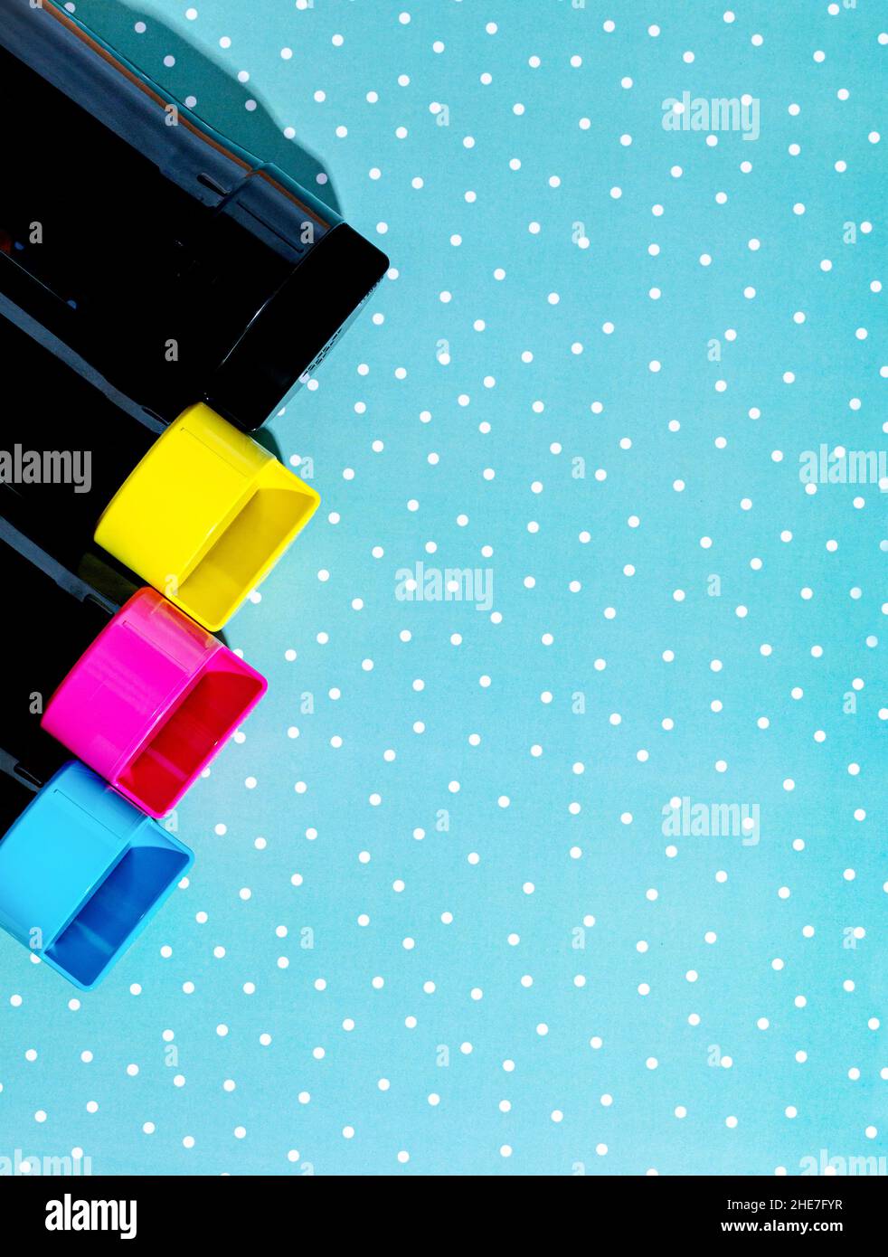 A set of toner cartridges for a color laser printer on a snowy ...