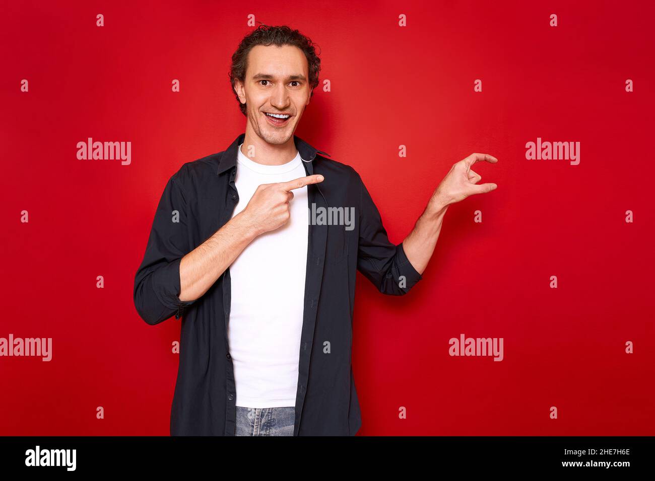 Demonstrates Small Thing Isolated Shot Man Making Small Gesture With Hand Measuring Tiny Object