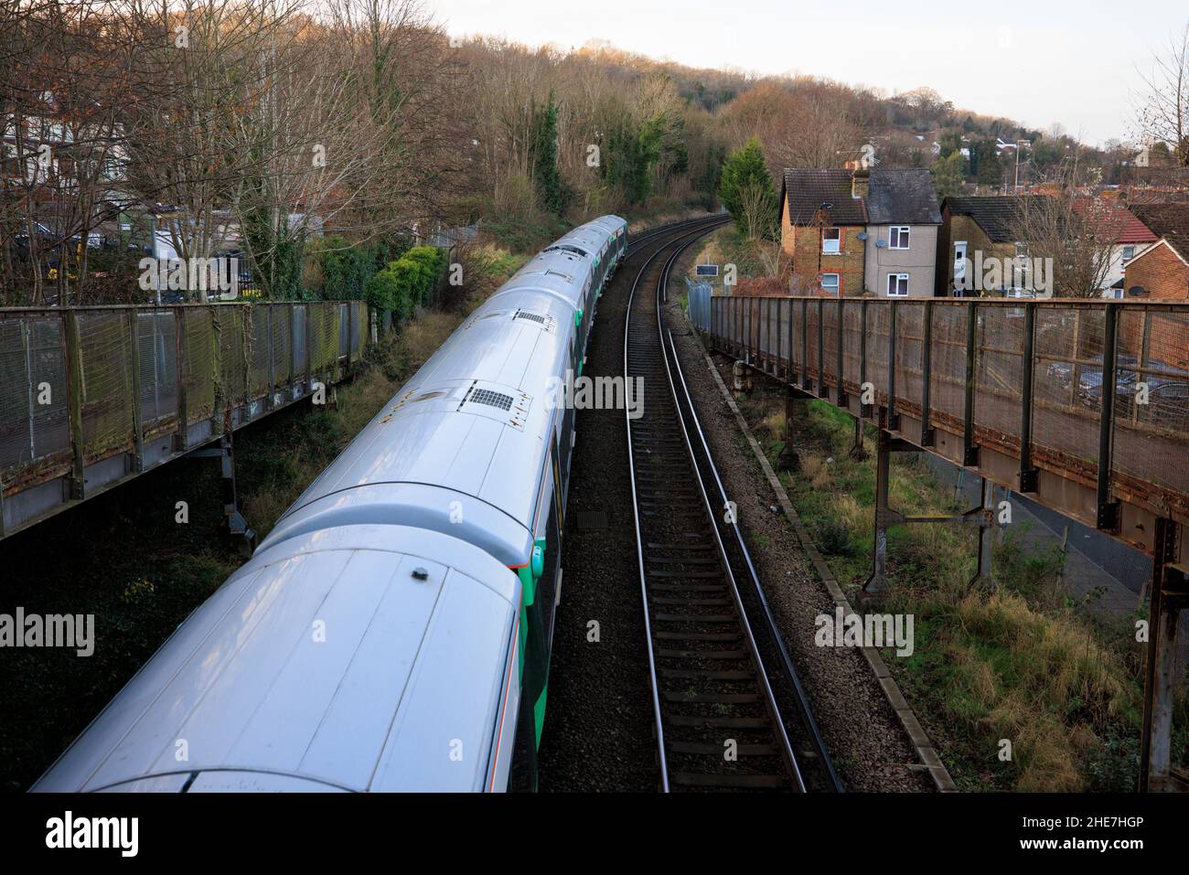 A train on tracks near Kenley train station in South London Stock Photo ...