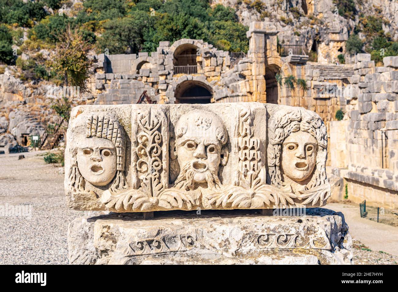 carved stone faces - antique theater masks - in the ruins of the ...