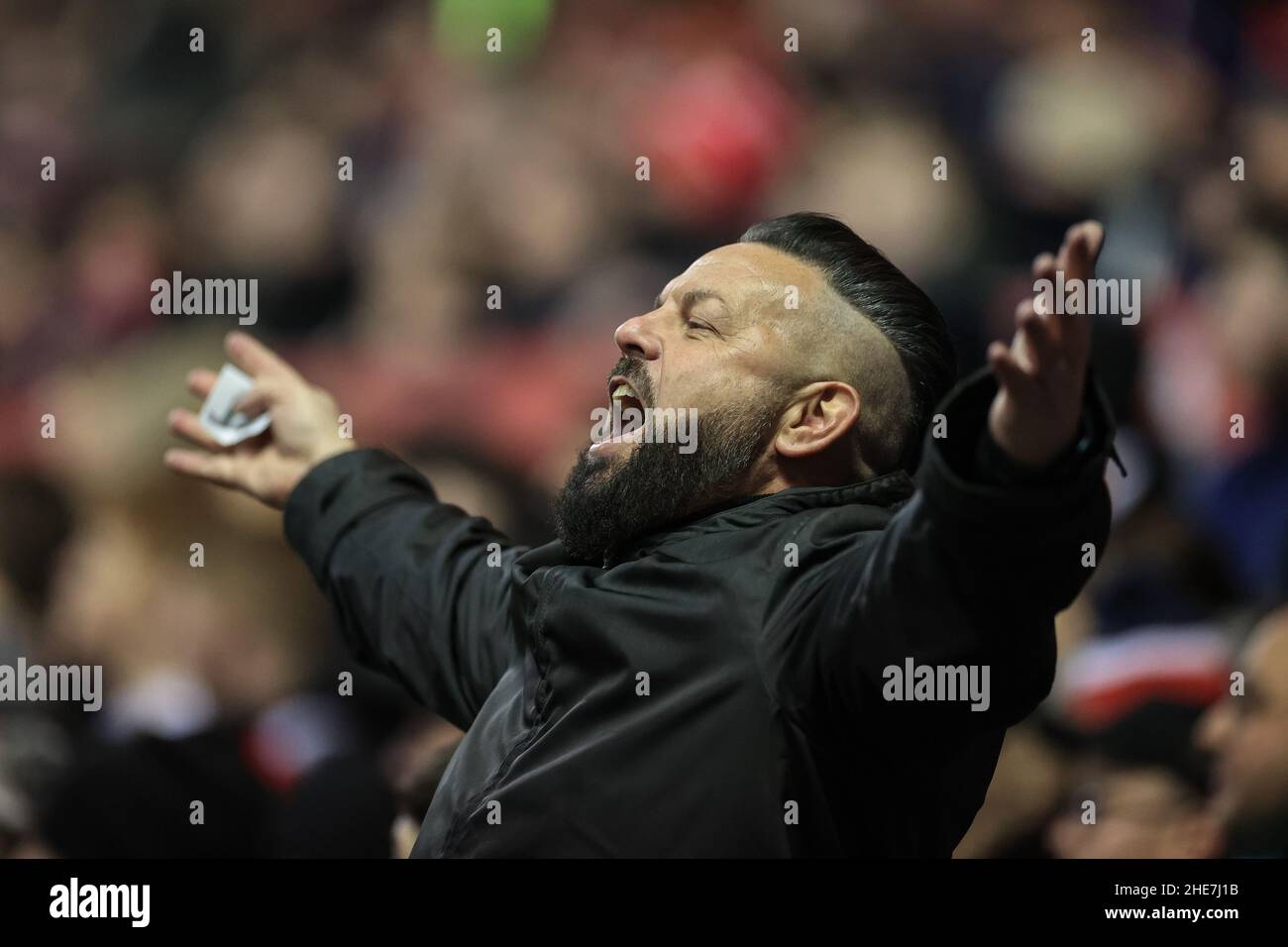 A Nottingham Forest fans sings his heart out as the game gets underway ...