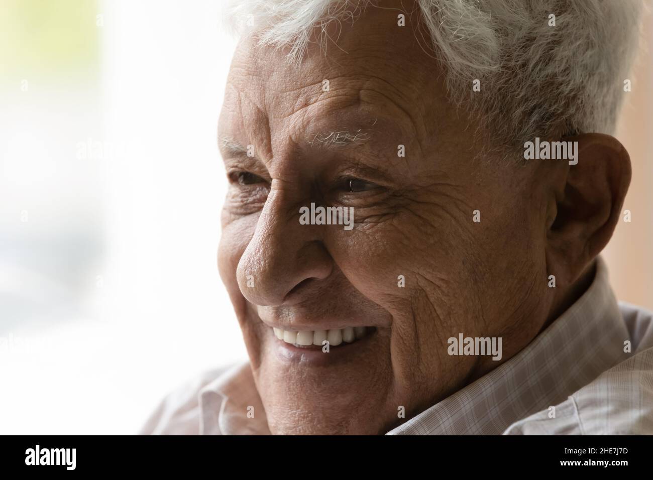Close up happy old man looking in distance Stock Photo - Alamy