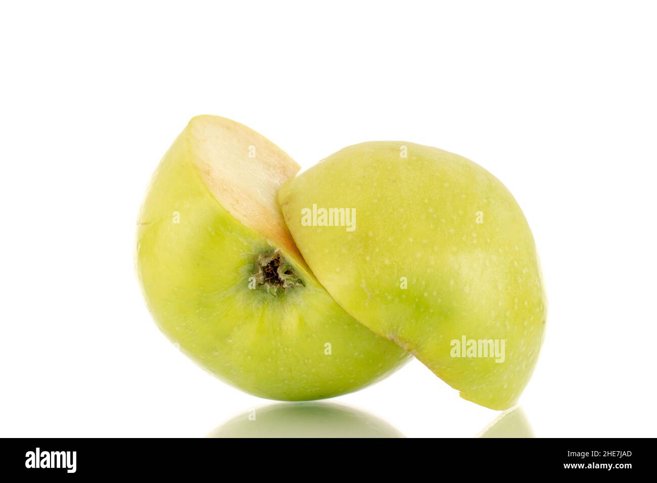 Two halves of a sweet green apple, close-up, isolated on white Stock ...