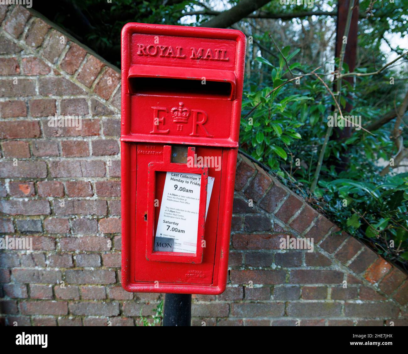 A Royal Mail Lamp Box post box on a street corner in Kenley, South ...