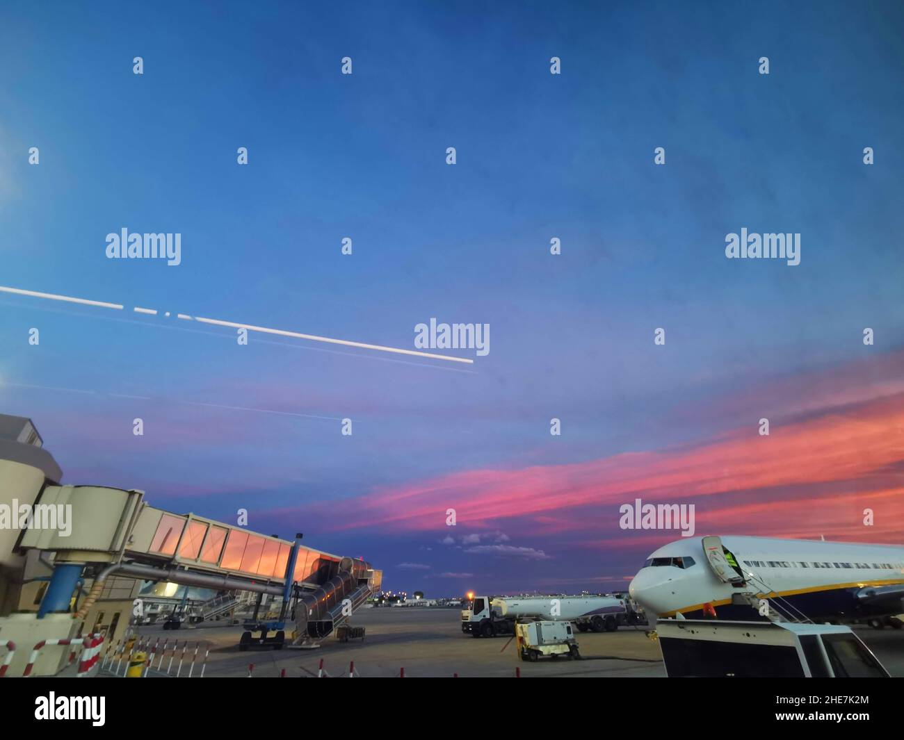 Plane has just landed at the Manises Airport at sunset in Valencia ...