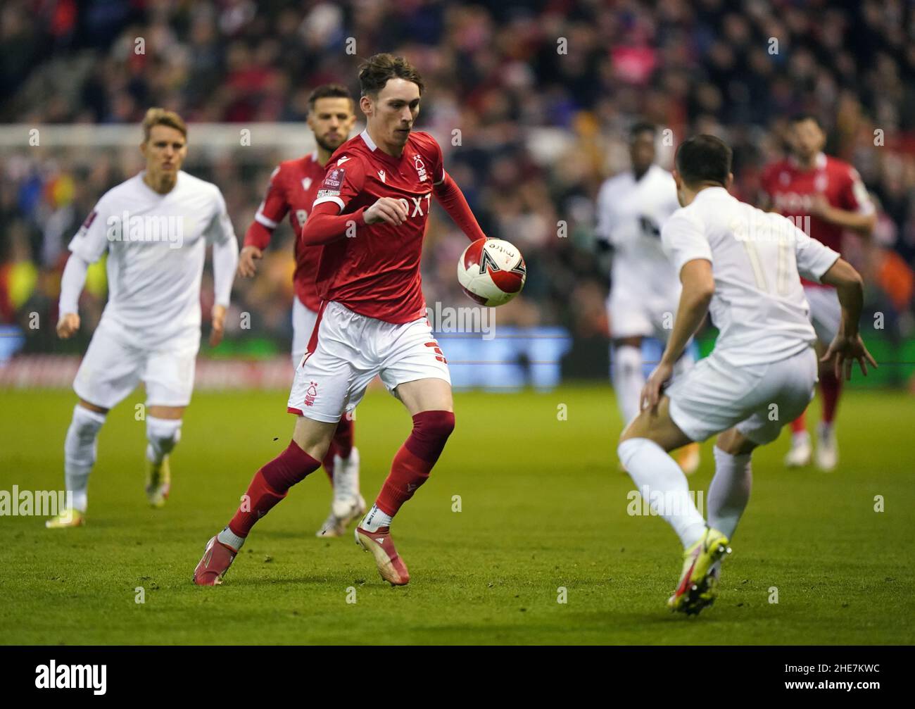 Nottingham Forest's James Garner (centre) and Arsenal's Cedric Soares ...