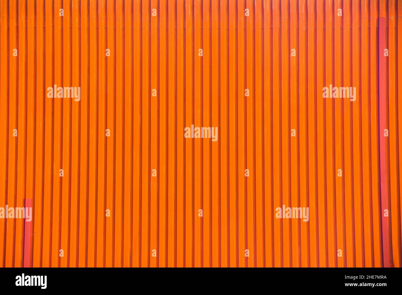 Orange metallic wall Stock Photo - Alamy