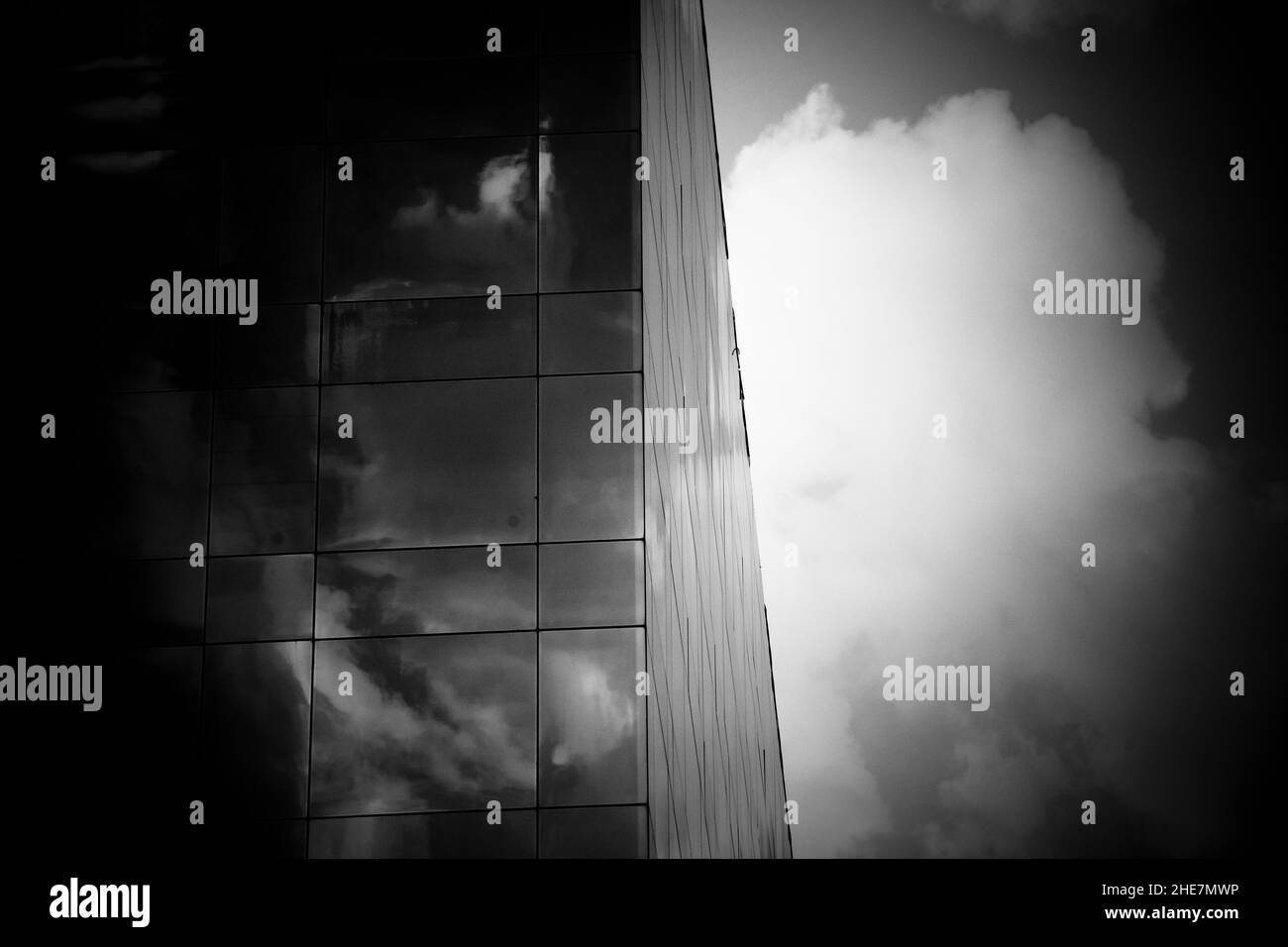 Office building and cloud Stock Photo - Alamy