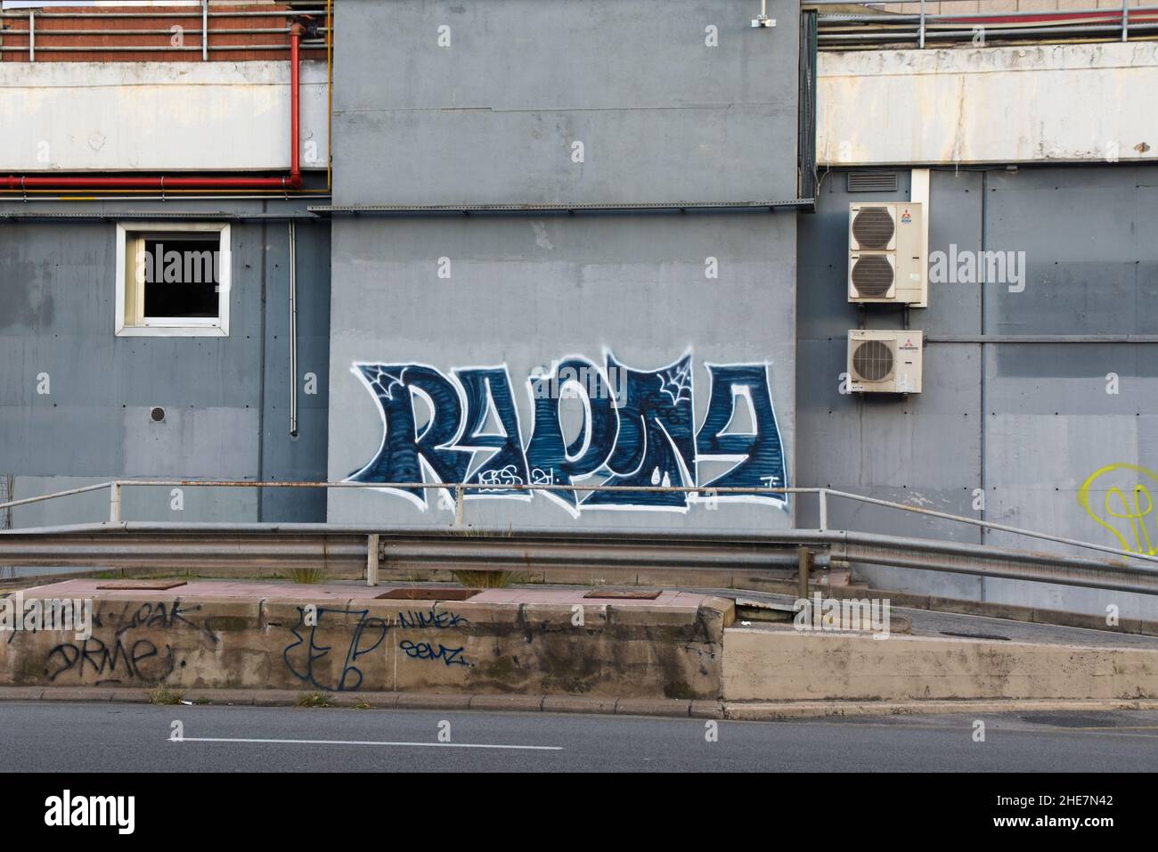 Graffiti words on a wall Stock Photo - Alamy