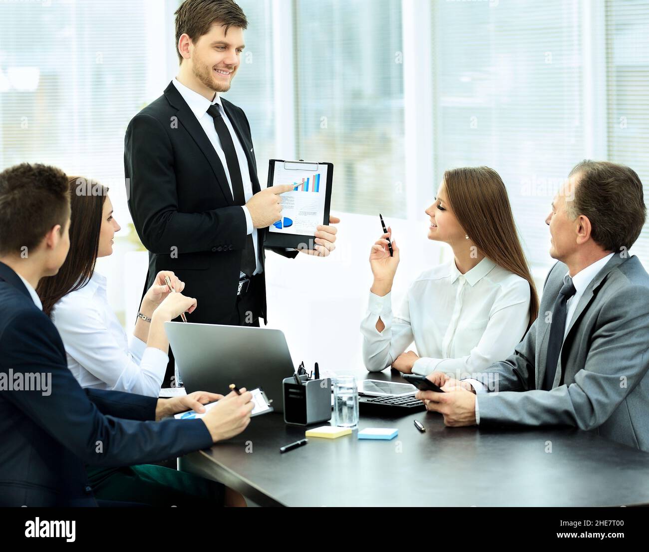successful businessman and his business team meeting in a modern office ...