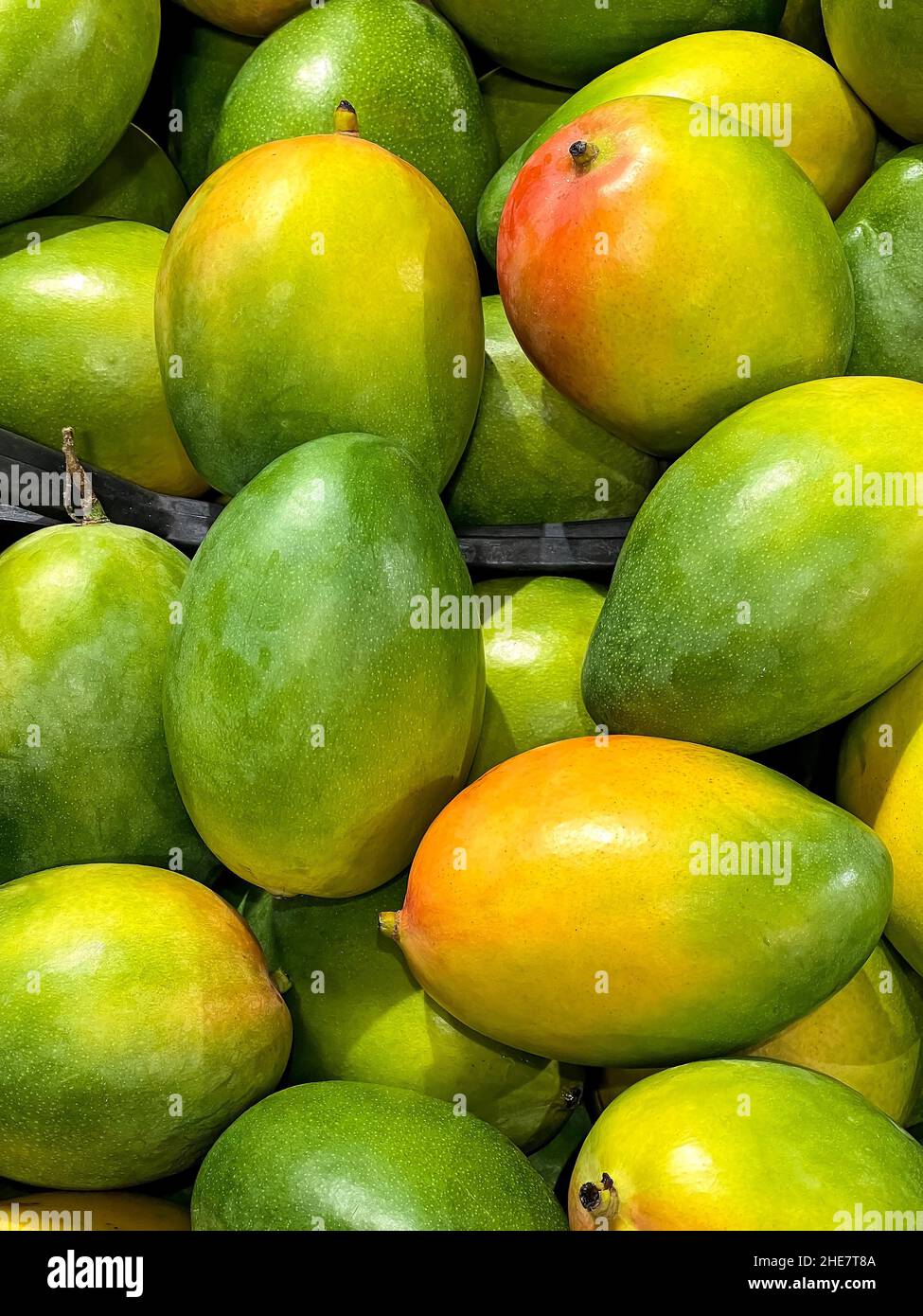 Fresh ripe mango fruit background Stock Photo - Alamy