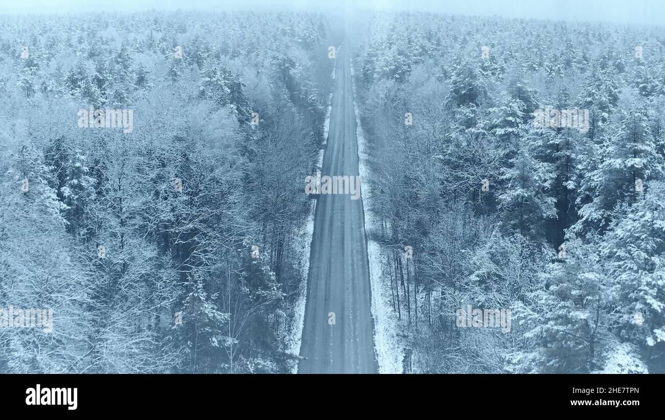Aerial view road through coniferous forest winter hi-res stock photography and images - Alamy