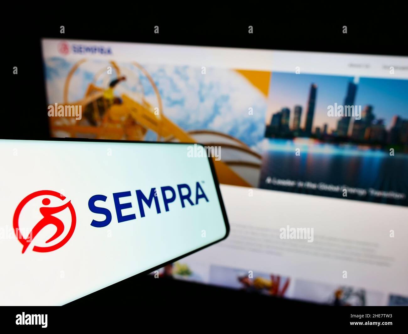 Smartphone with logo of American power and gas company Sempra Energy on ...