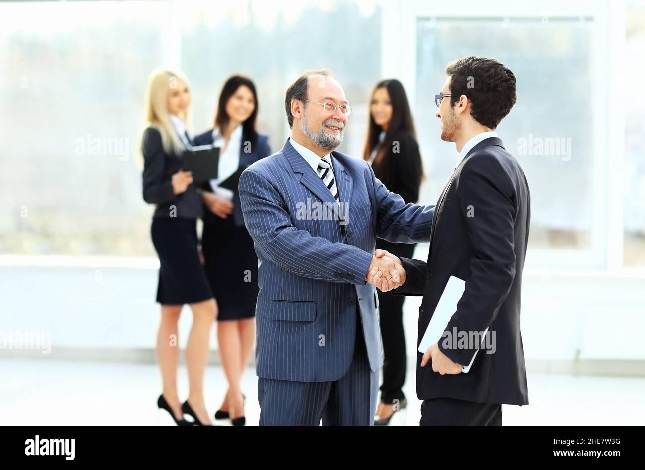 the meeting of two business partners at the presentation Stock Photo ...
