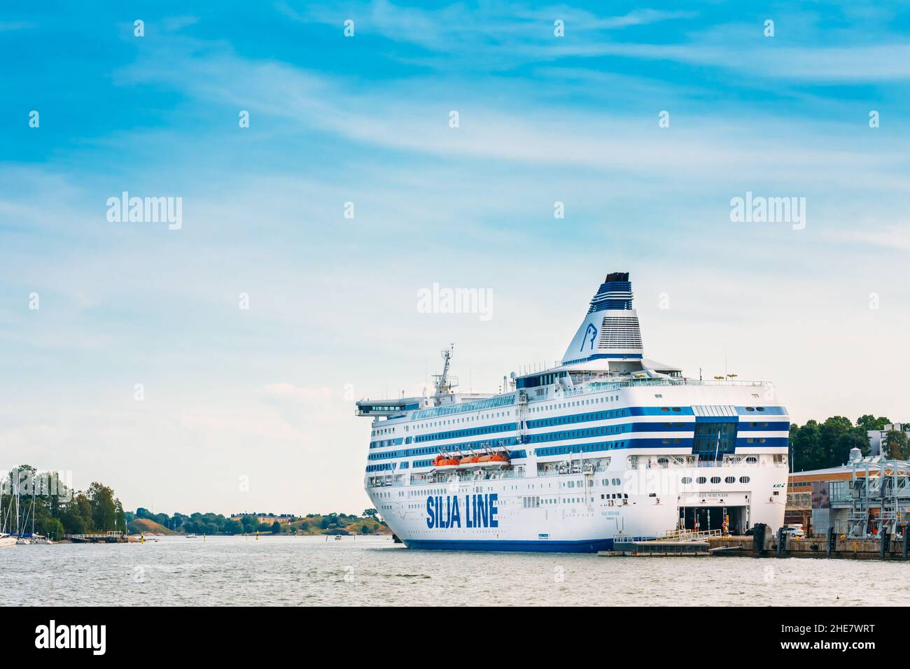 Modern ferry boat Silja Line at pier awaiting loading cargo from port ...
