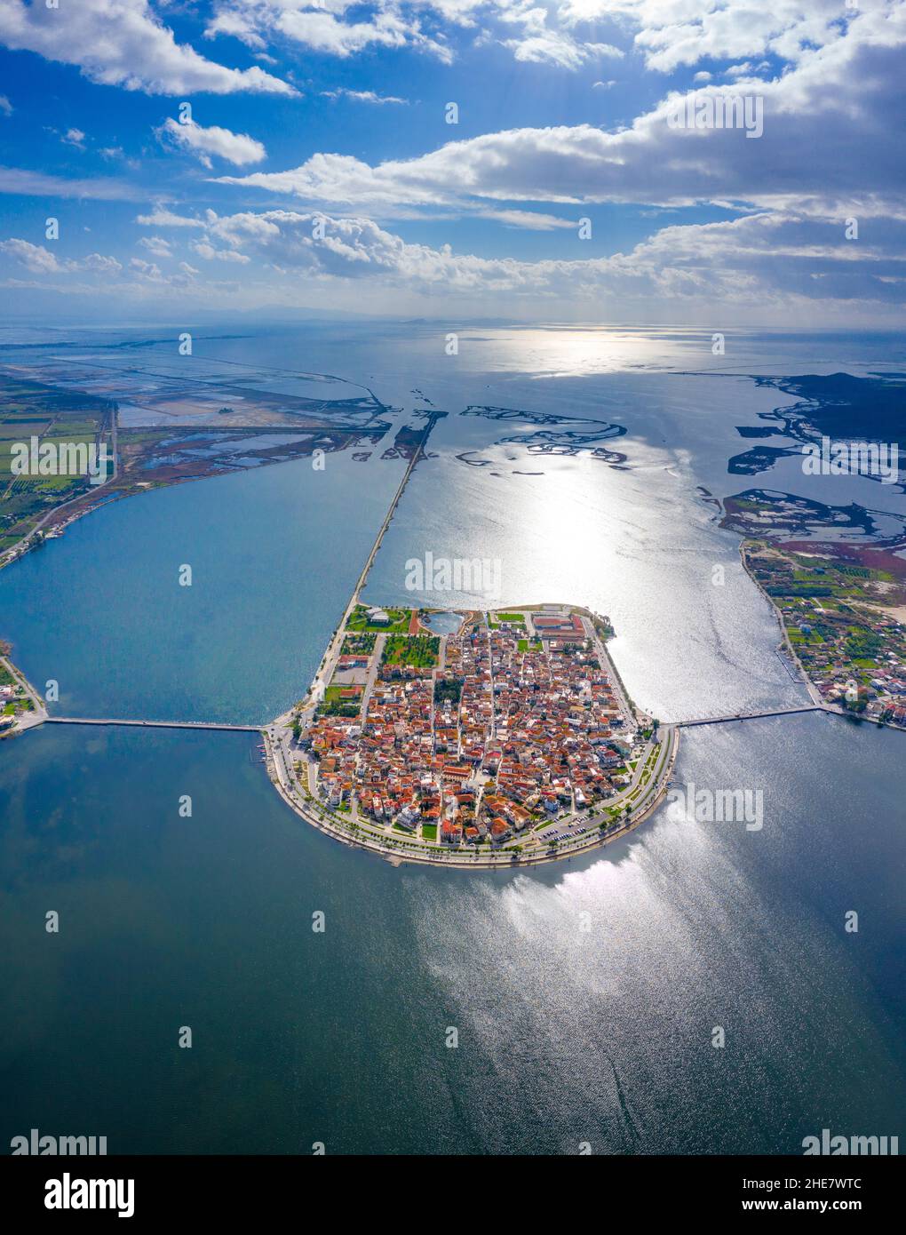 Aerial drone view of the famous island - fishing village of Aitoliko in ...
