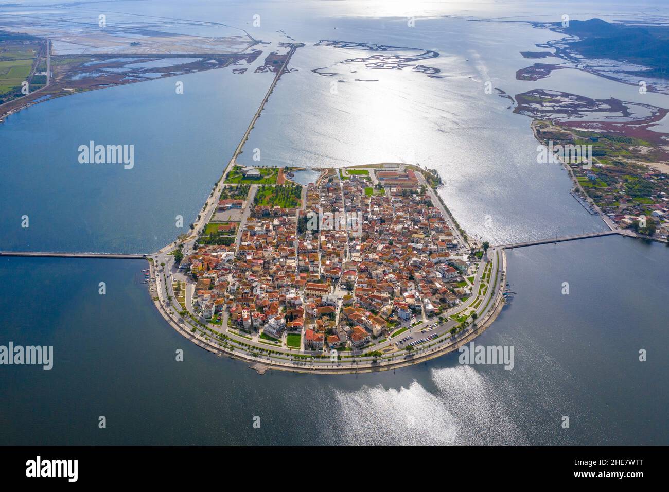 Aerial drone view of the famous island - fishing village of Aitoliko in ...