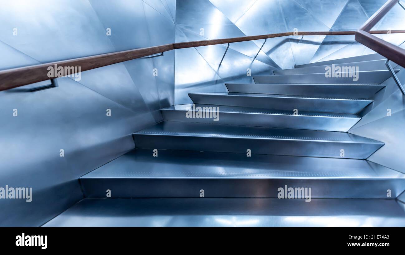 Silver metal spiral staircase modern staircase upwards with backlight ...