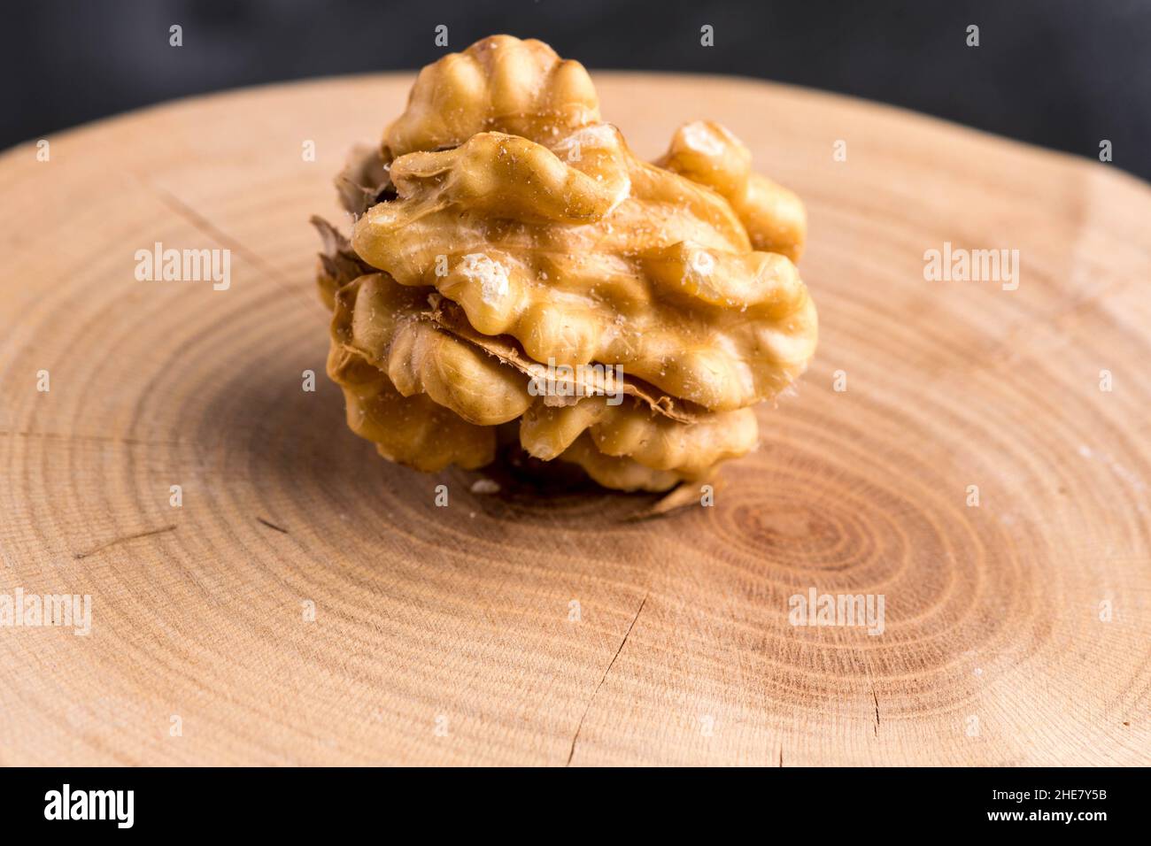 Walnut opened in warm light Stock Photo - Alamy