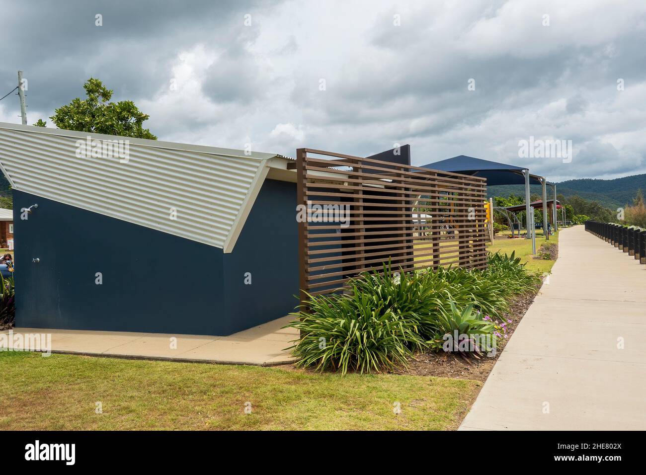 Toilet building with outdoor show available for public use in a park ...