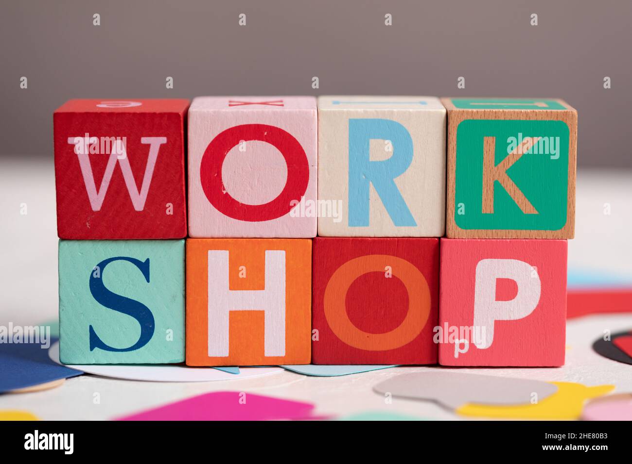 Closeup of word workshop seminar of colorful wood cubes Stock Photo - Alamy
