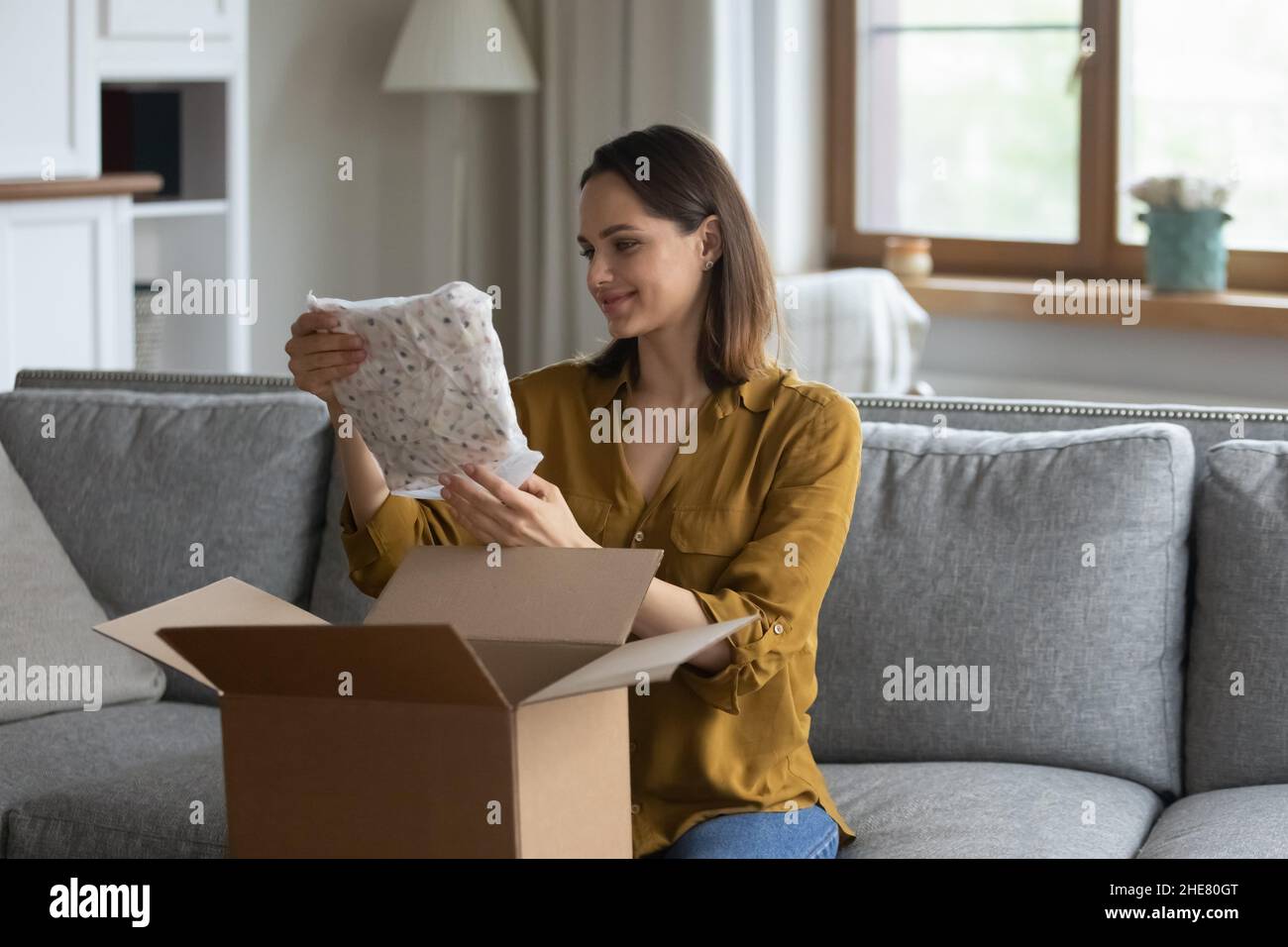 Happy customer receiving package from hi-res stock photography and ...