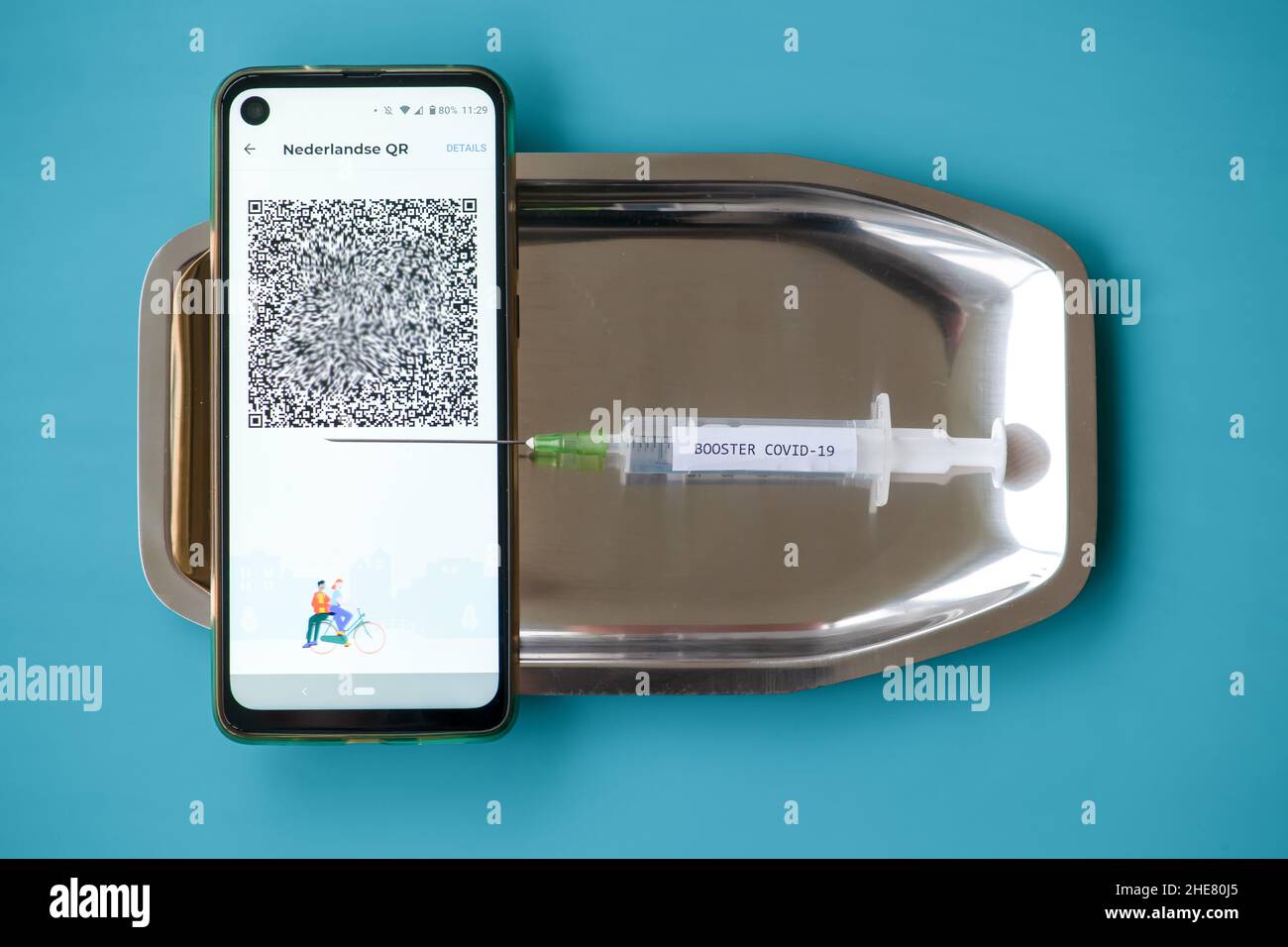 Booster vaccination and QR code Stock Photo - Alamy