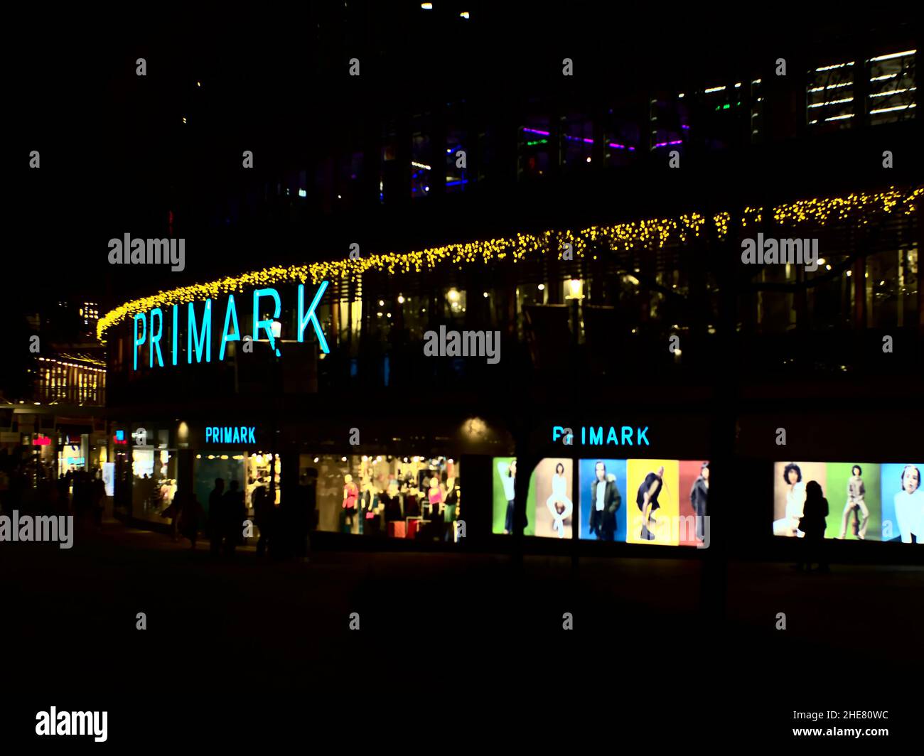 Seville, Spain; January 4th, 2021: Night photo of two PRIMARK neon ...