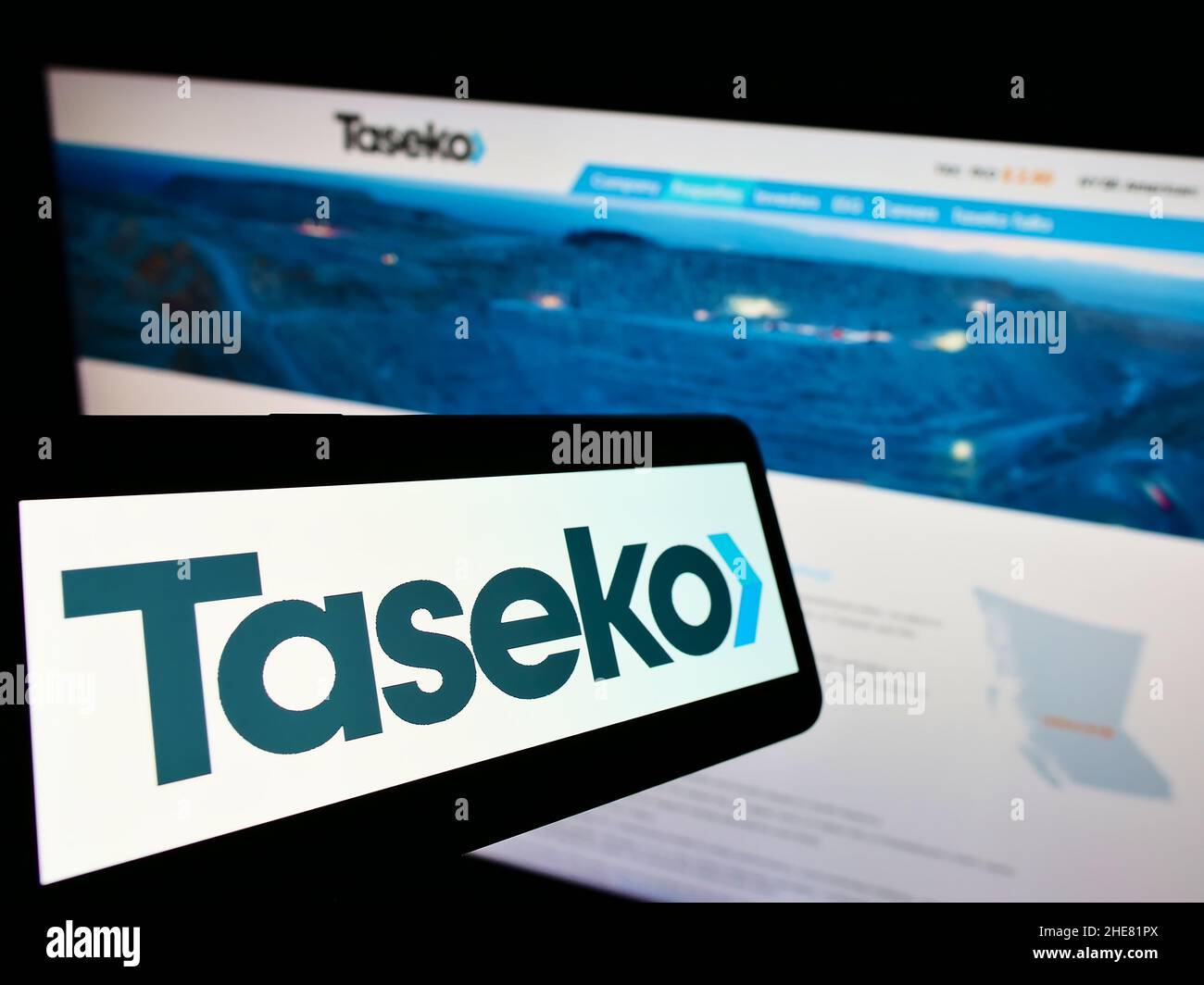 Cellphone with logo of Canadian mining company Taseko Mines Limited on ...