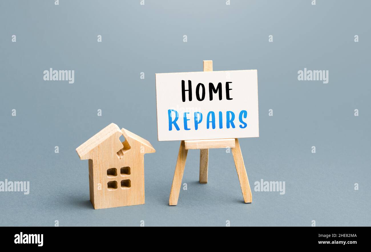 Cracked house and home repair sign. Restoration of the structure and ...