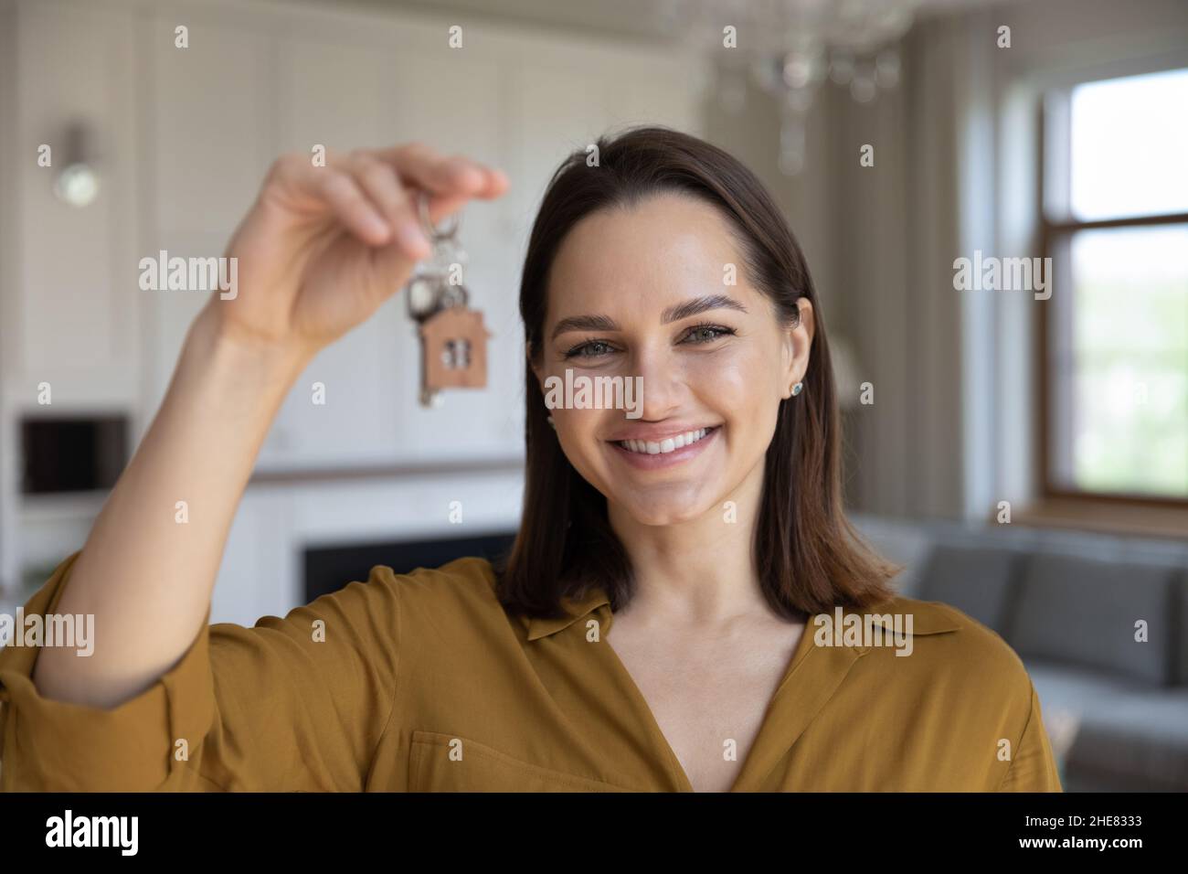 Happy cheerful real estate agent woman offering rent apartment Stock ...
